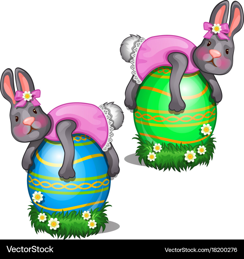 Two rabbits in pink dress lie on large easter eggs