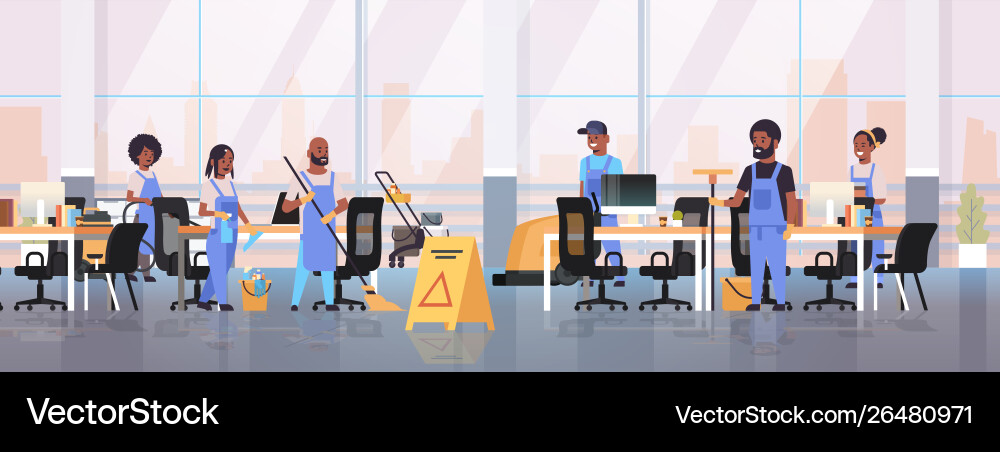 Cleaners team in uniform working together cleaning