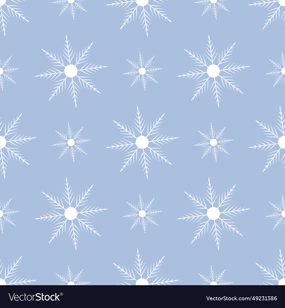 A seamless pattern of white snowflakes Royalty Free Vector