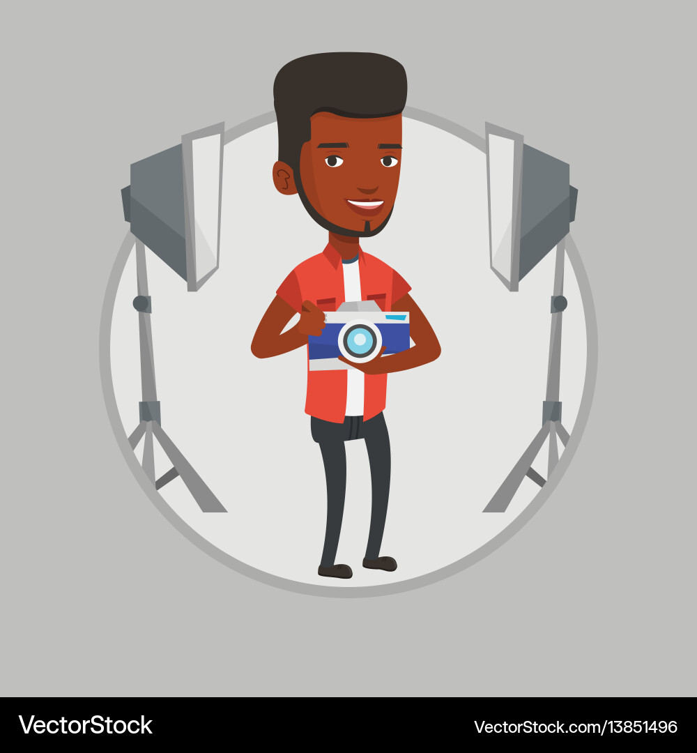 Photographer with camera in photo studio Vector Image