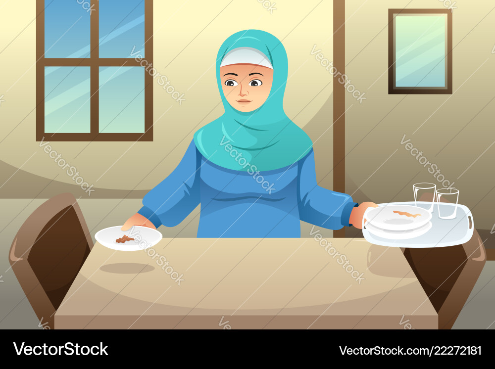 Muslim woman cleaning up dining table after dinner