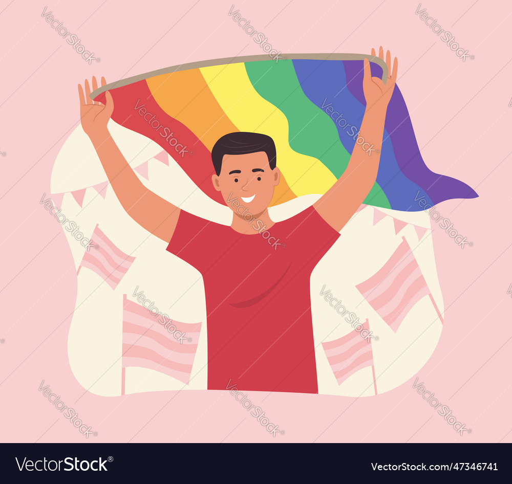 Gay man holding rainbow flag for pride celebration