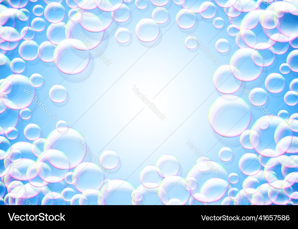 Soap bubbles abstract blue background with rainbow