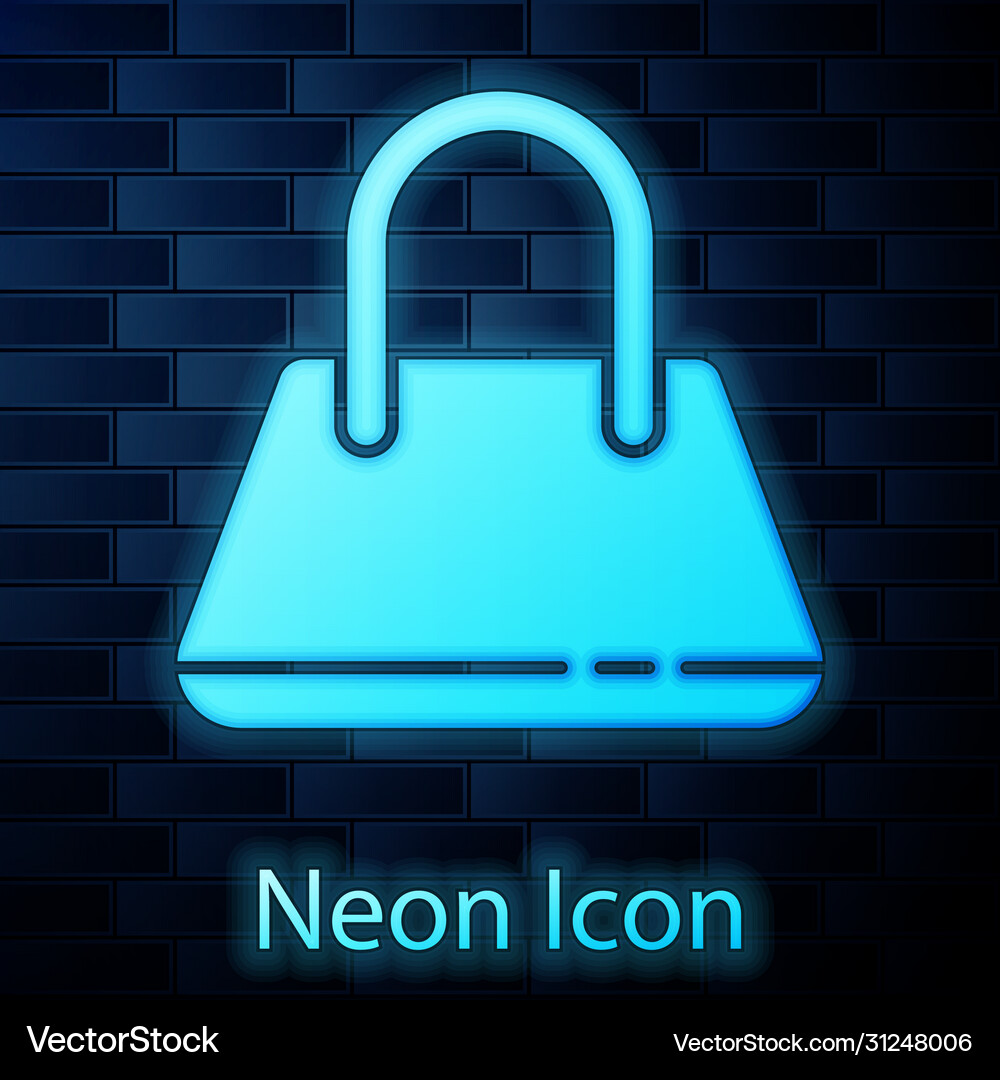 Glowing neon handbag icon isolated on brick wall Vector Image