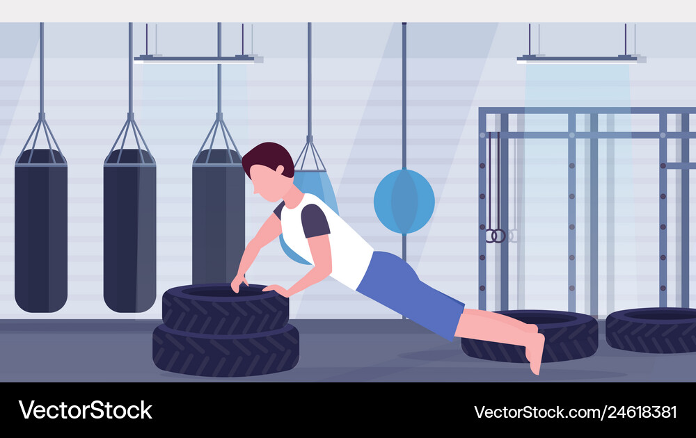 Sports man doing push-up exercise on tires Vector Image
