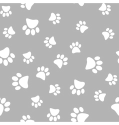 Seamless texture a paw print trail on white Vector Image