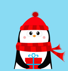 Cartoon penguin holding a heart Royalty Free Vector Image