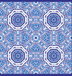 Seamless pattern blue tiles with abstract flower Vector Image